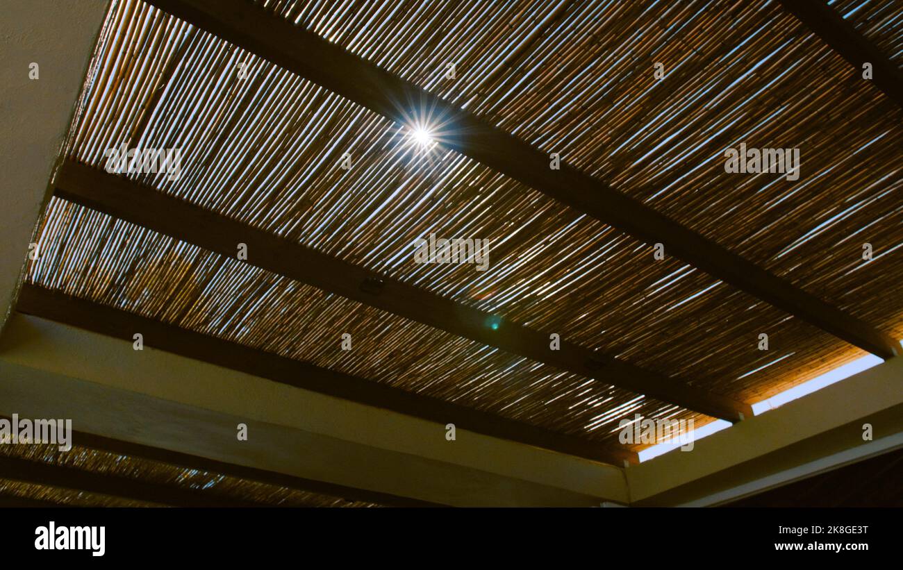 Thatched Roof Through Which Sunlight Enters. High quality Stock Photo ...