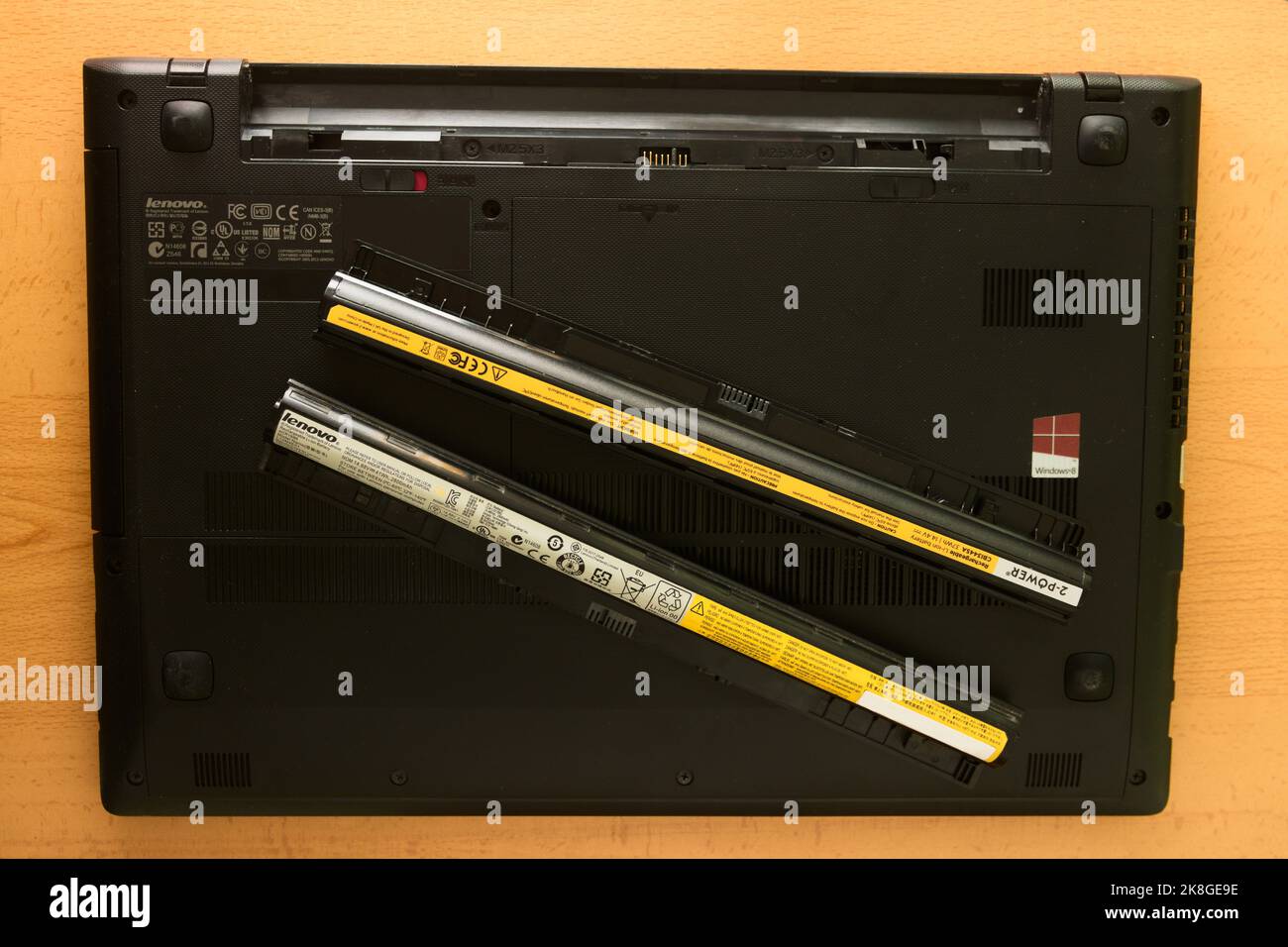 Picture from above of a pair of batteries, one used original and one ...