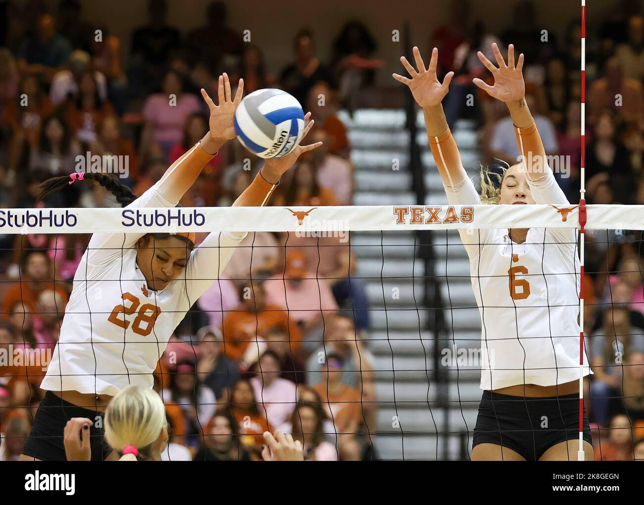 October 22, 2022: Texas middle blocker KAYLA CAFFEY (28) and outside ...