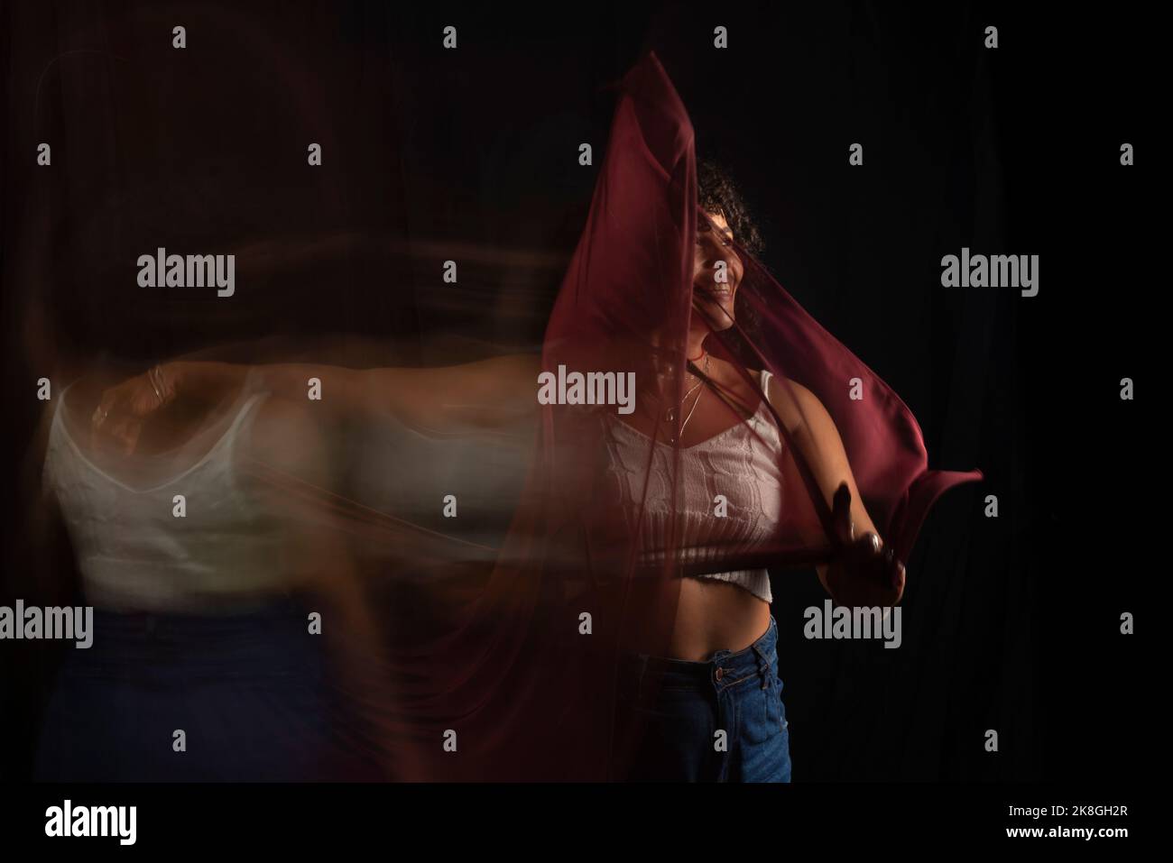 Time lapse view of woman moving a rag. Long exposure, motion blur ...