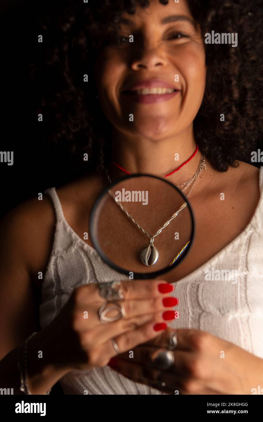 Black girl with magnifying glass hi-res stock photography and images - Alamy
