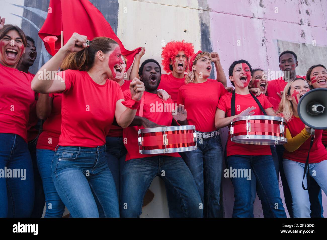 Group of fans from different cultures feeling and defending the colors ...