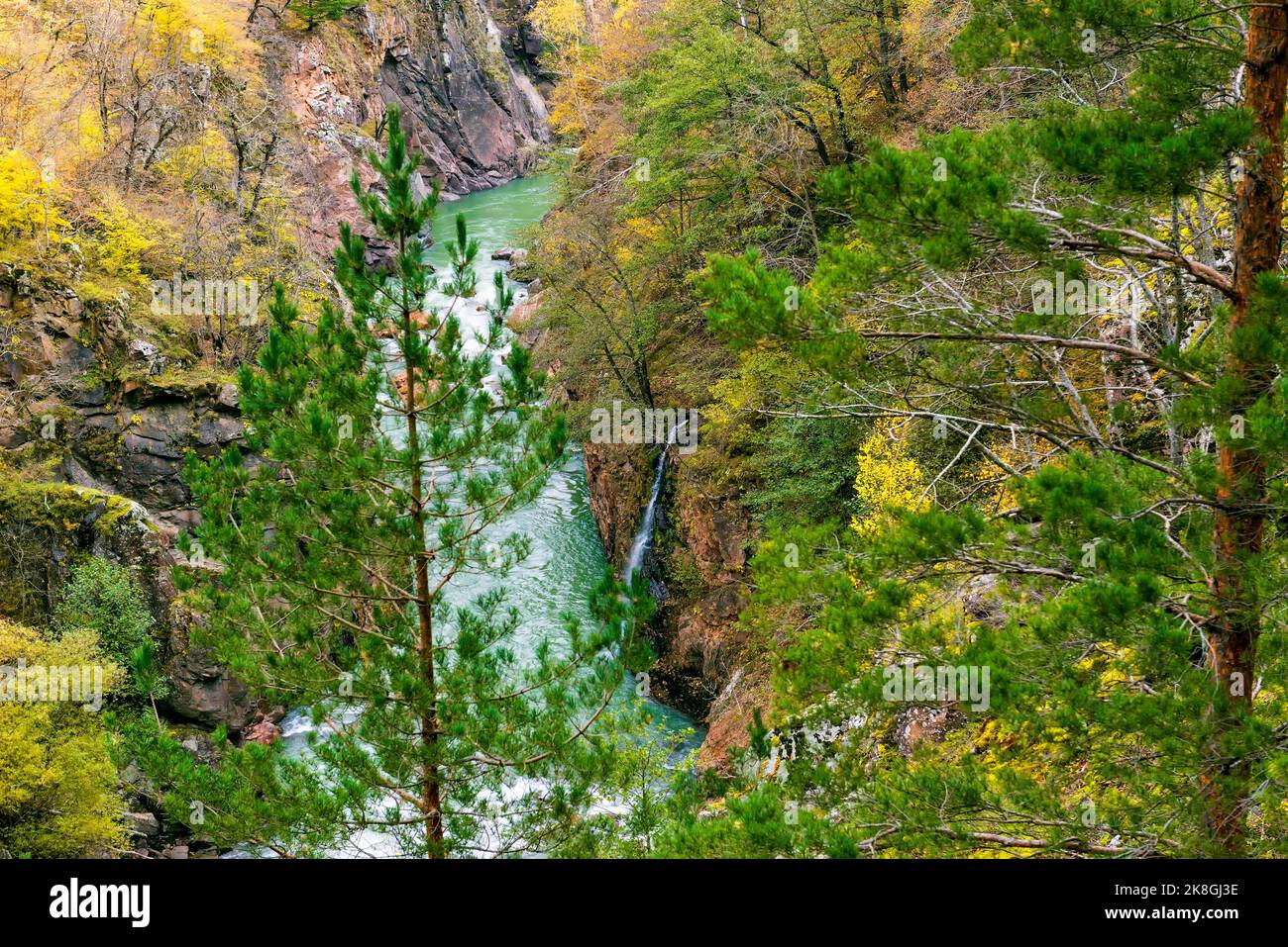 Landscape of the gorge with a river at the bottom and a waterfall Stock ...