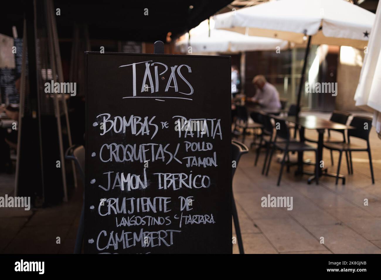 Tapas bar in the historic center in Barcelona Spain. Advertising board ...