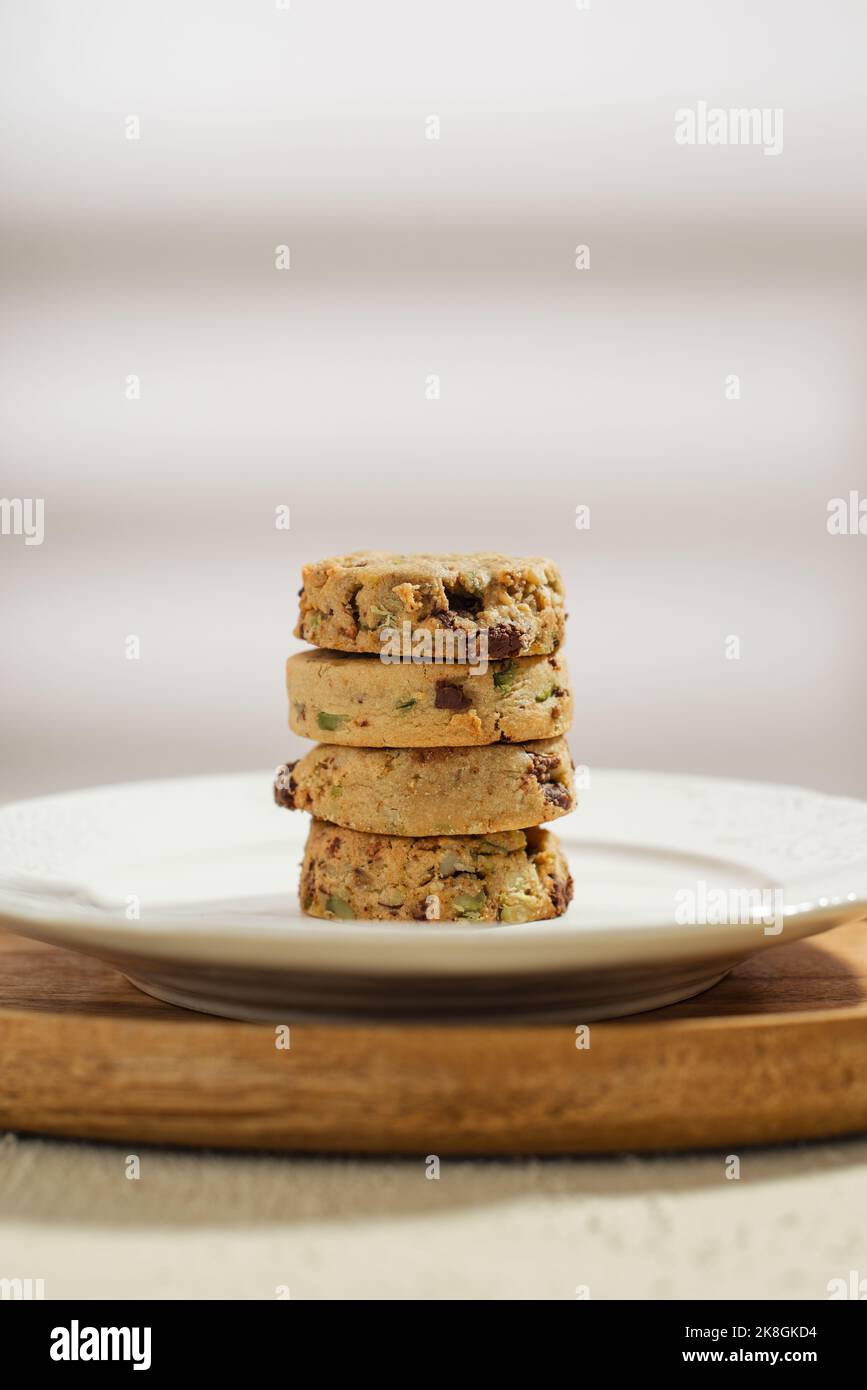 Plate with stack of tasty biscuits placed on table Stock Photo - Alamy