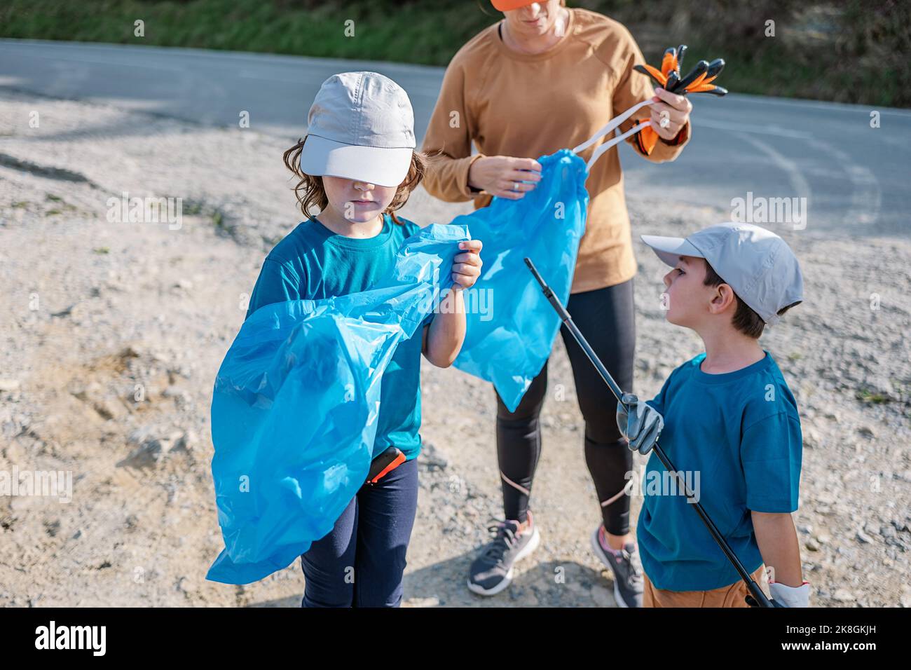 Children in uniform with bags hi-res stock photography and images - Alamy