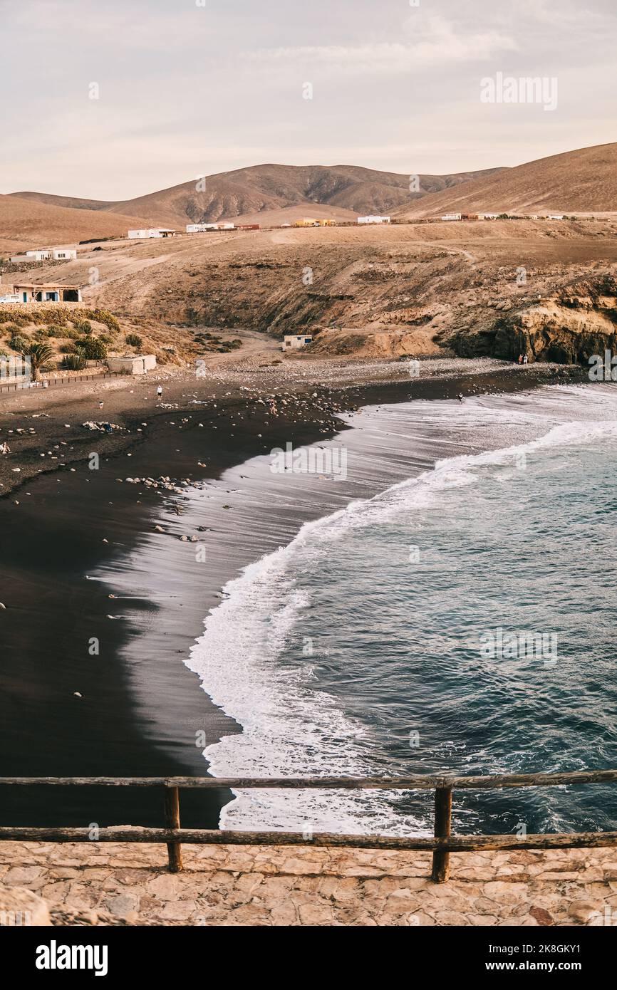 From above picturesque scenery of powerful ocean with foamy waves ...