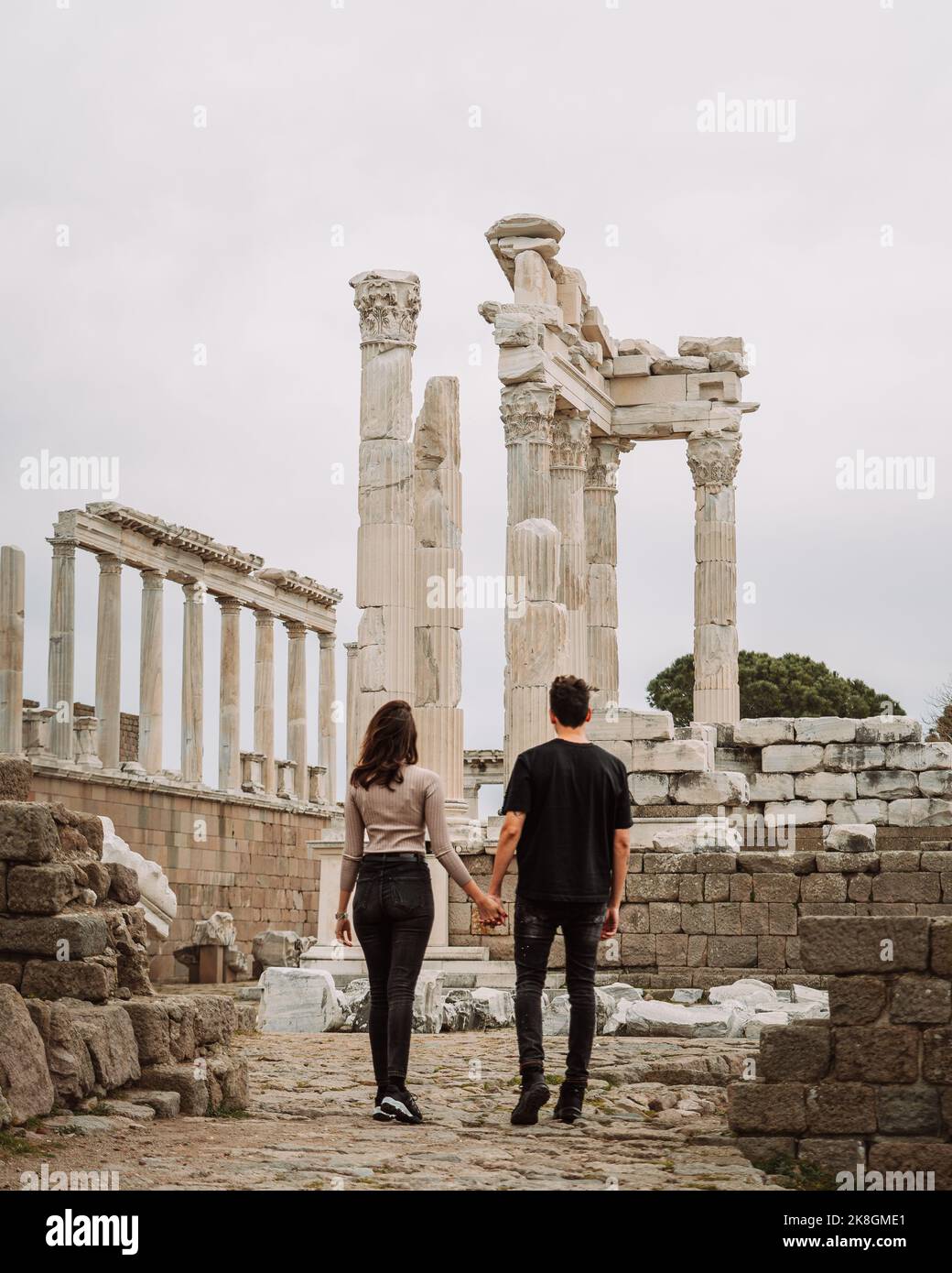Full body anonymous man and woman holding hands and admiring broken ...