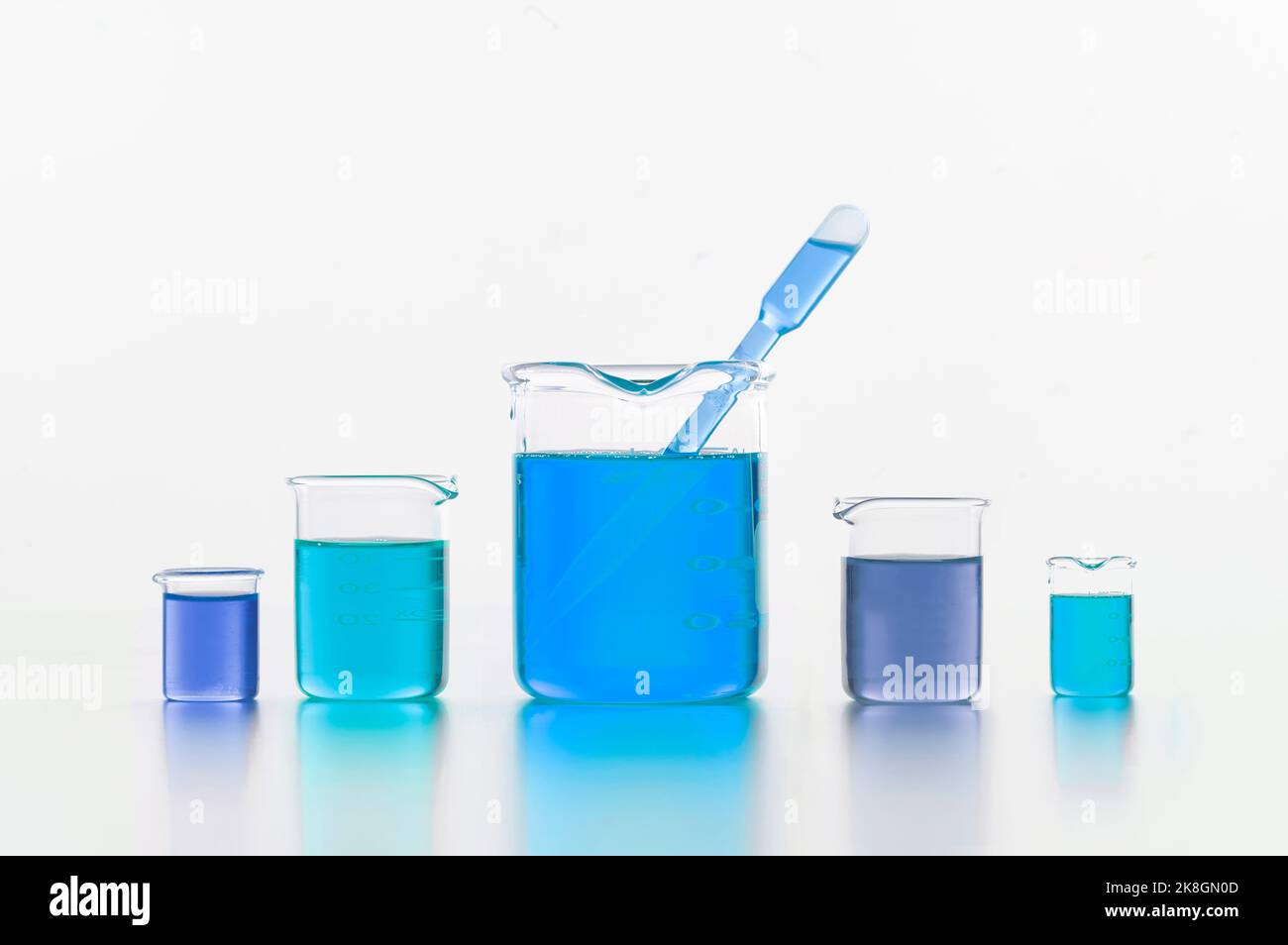 Collection of glass laboratory flasks of various sizes and shapes ...