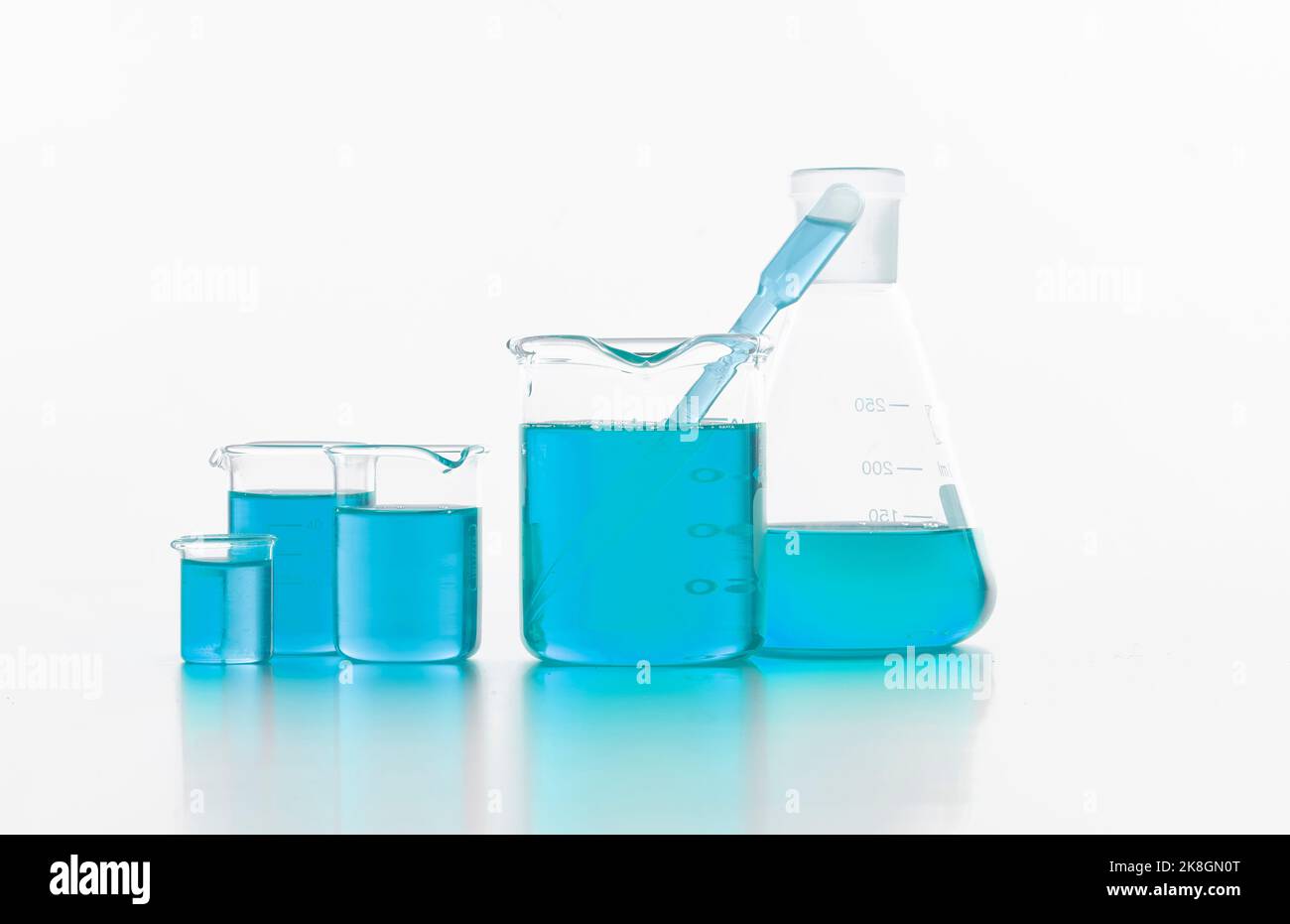 Collection of glass laboratory flasks of various sizes and shapes ...