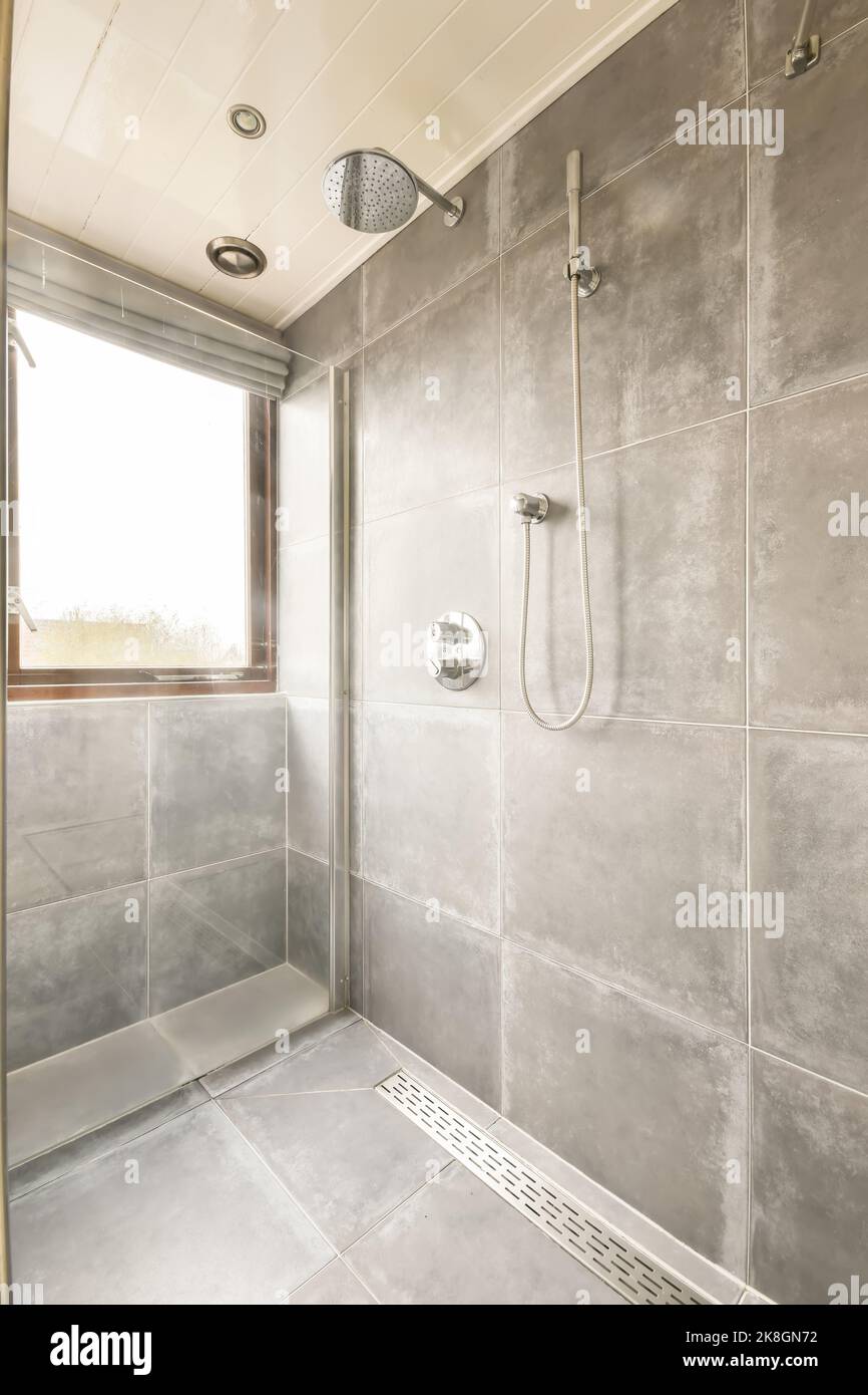 Interior of a modern shower with white walls Stock Photo - Alamy