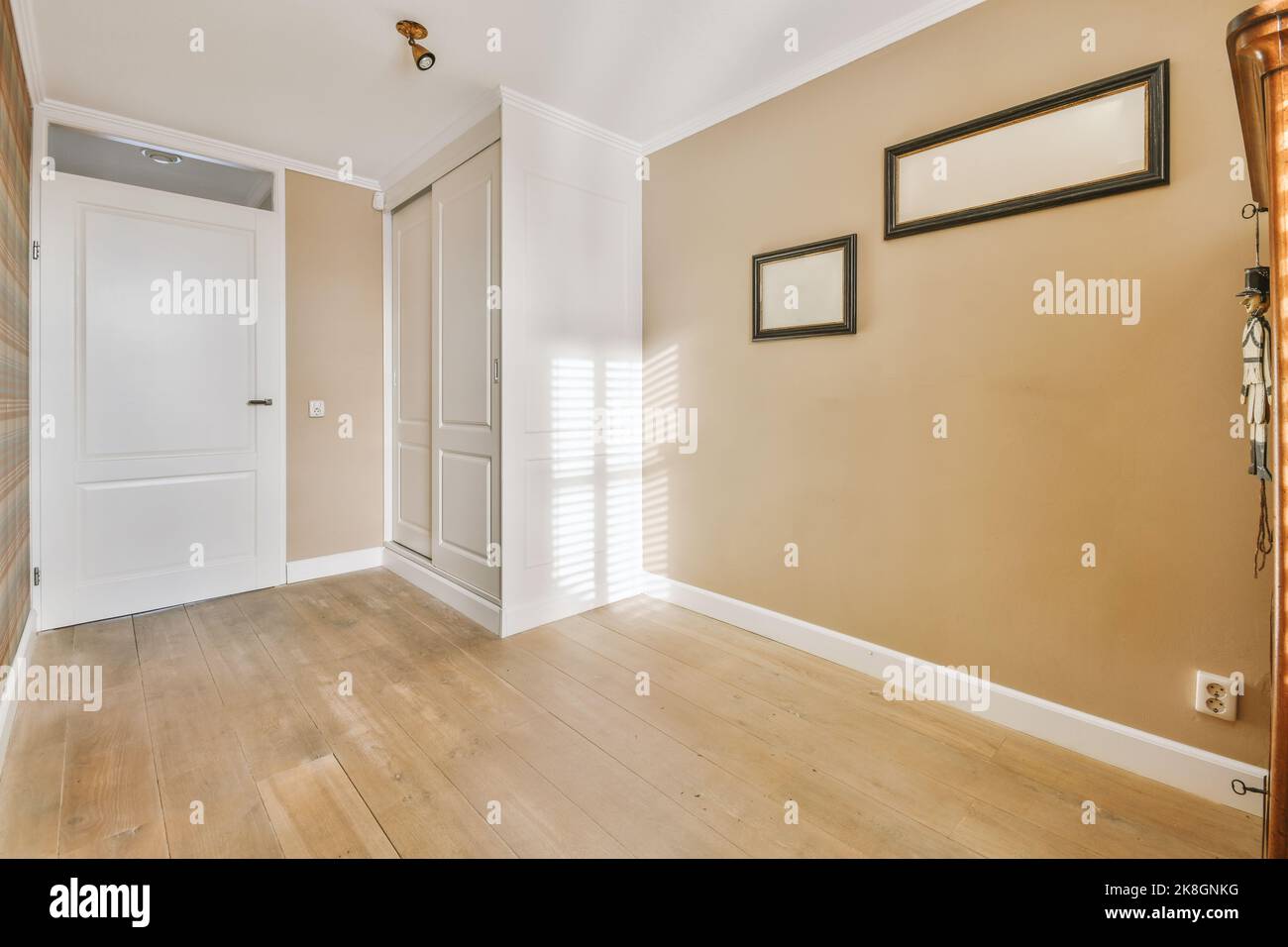 Interior of spacious empty light room with laminated flooring Stock ...