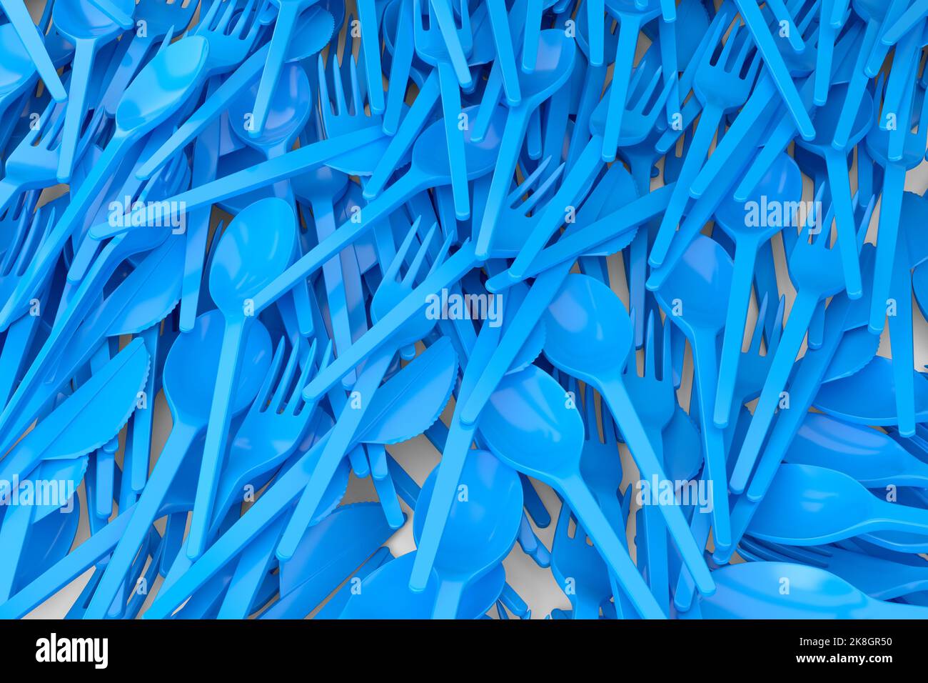 Heap of disposable utensils like spoon, fork and knife on white ...