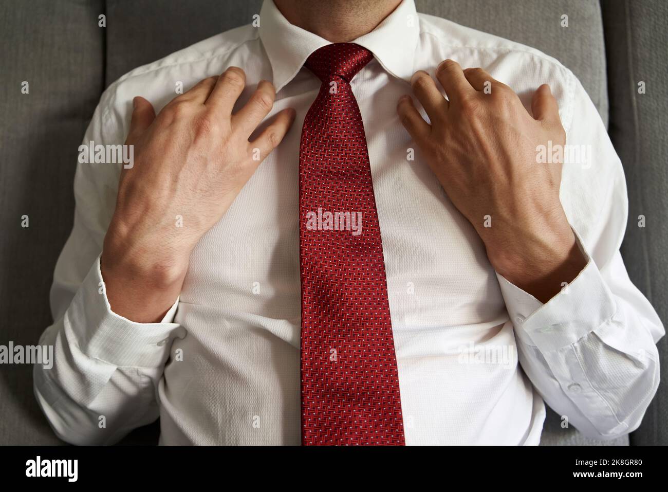 Businessman or manager practicing EFT or emotional freedom technique ...