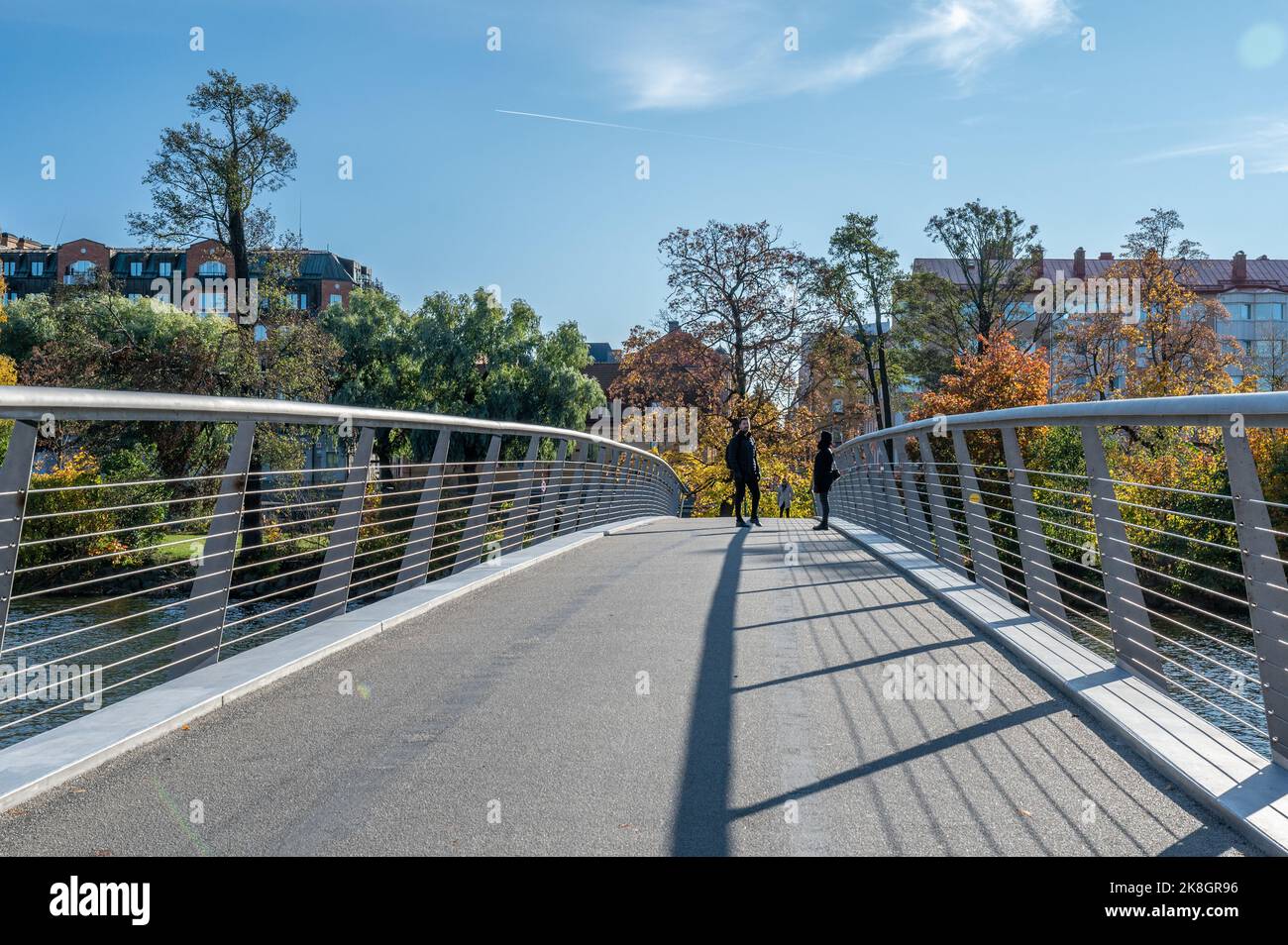 Footbridge from Saltängen waterfront across Motala river to ...