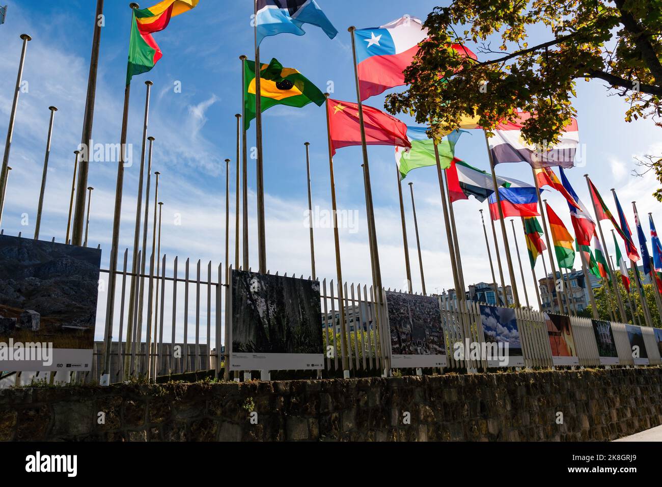 Flags fluttering in the wind in front of the UNESCO in Paris, France ...