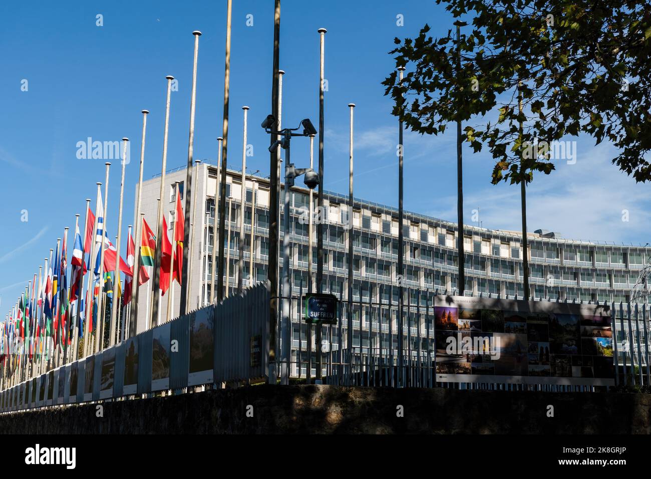 Flags fluttering in the wind in front of the UNESCO in Paris, France ...
