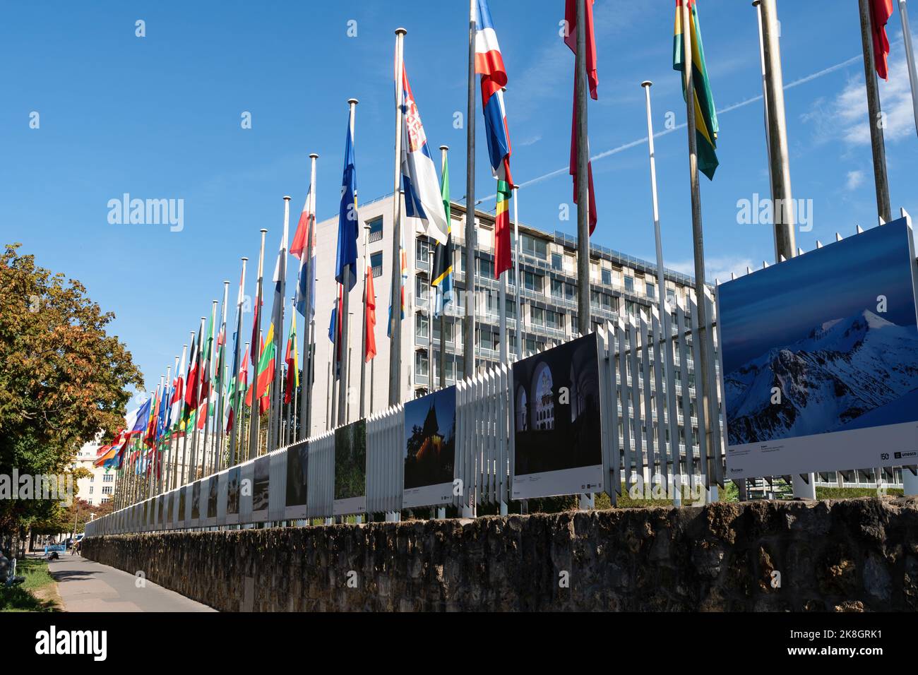 Flags fluttering in the wind in front of the UNESCO in Paris, France ...
