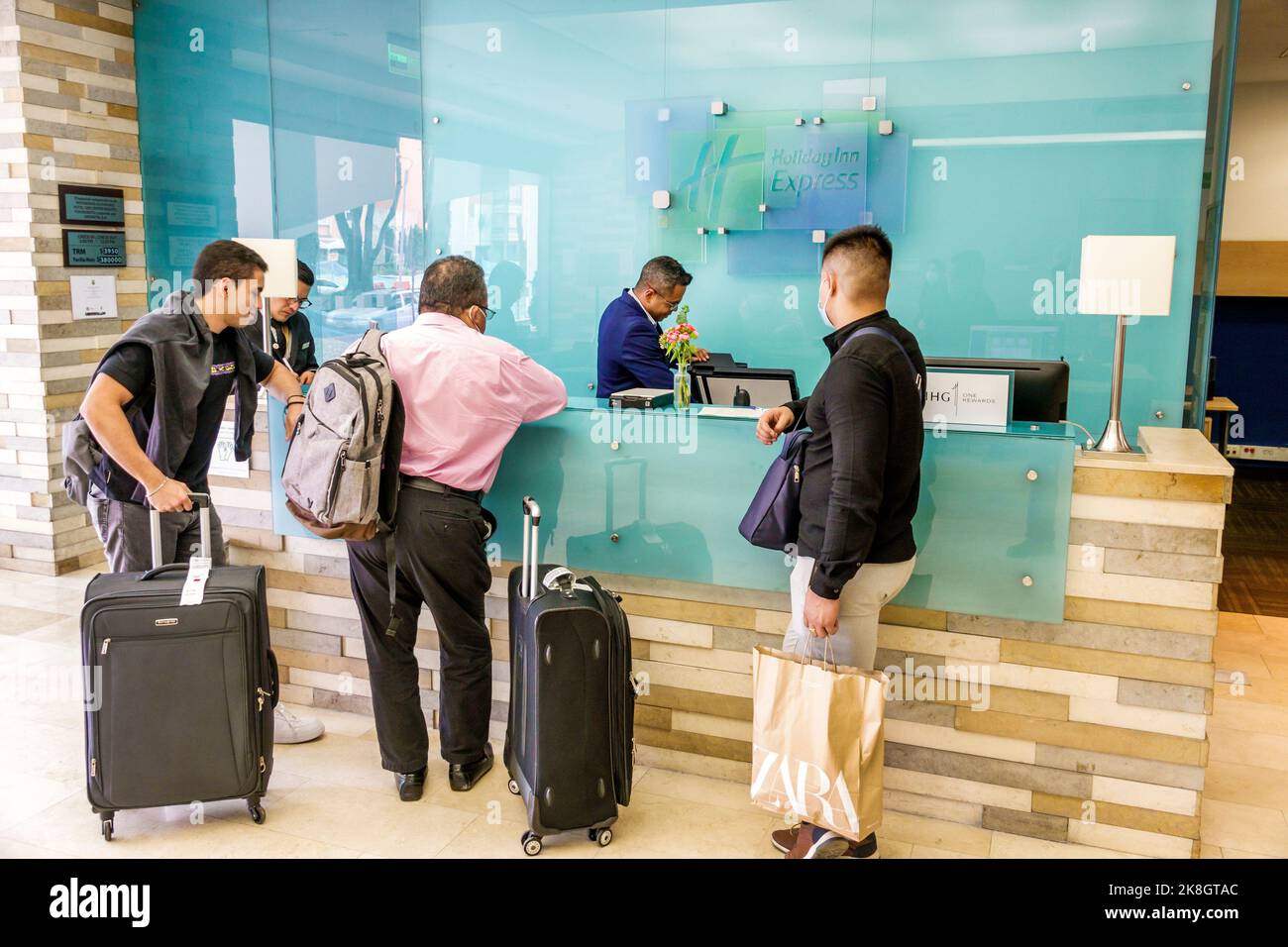 Front desk check in reservation reservations reception counter agent ...