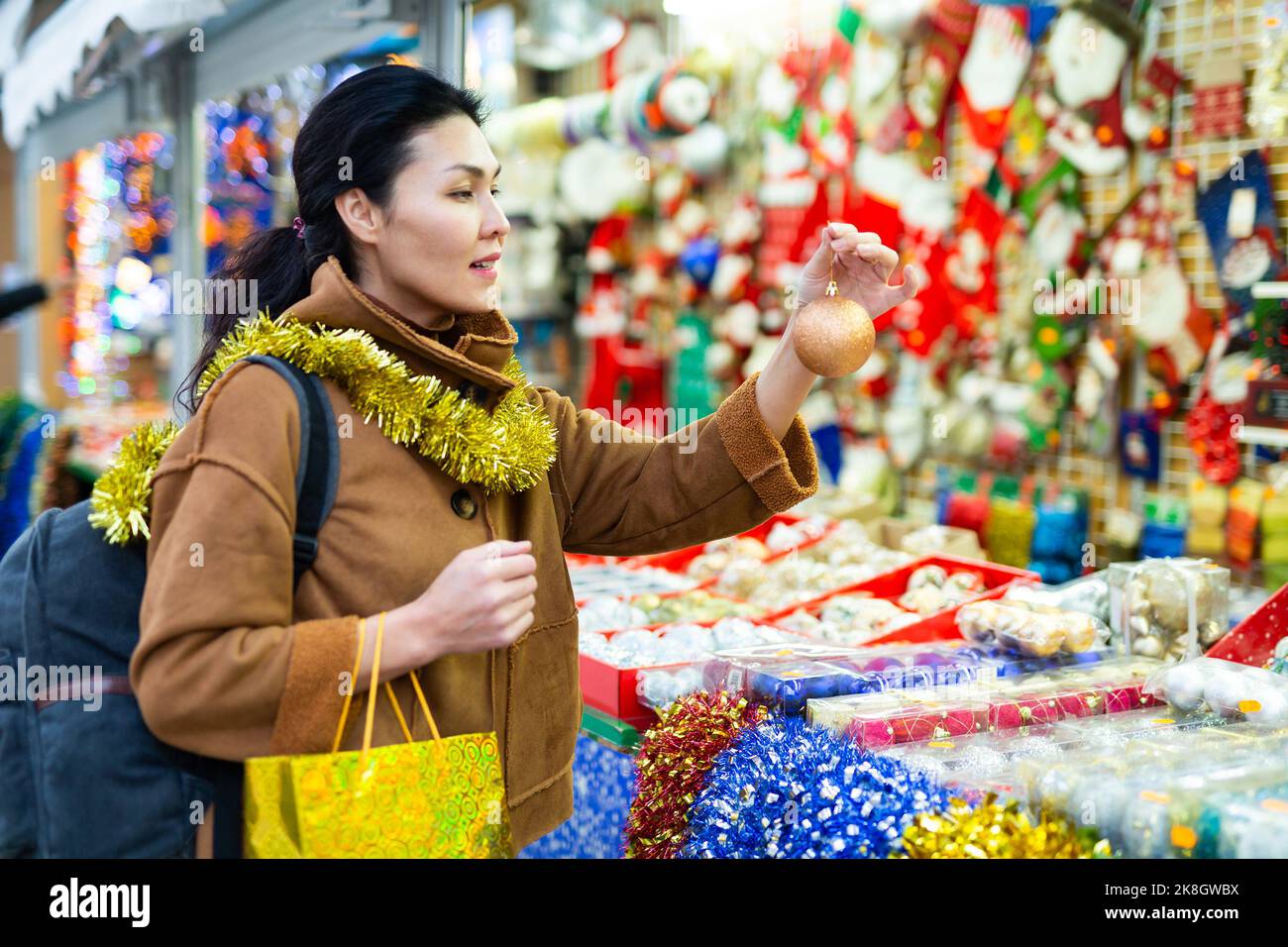 Female purchaser choosing winter hi-res stock photography and images ...