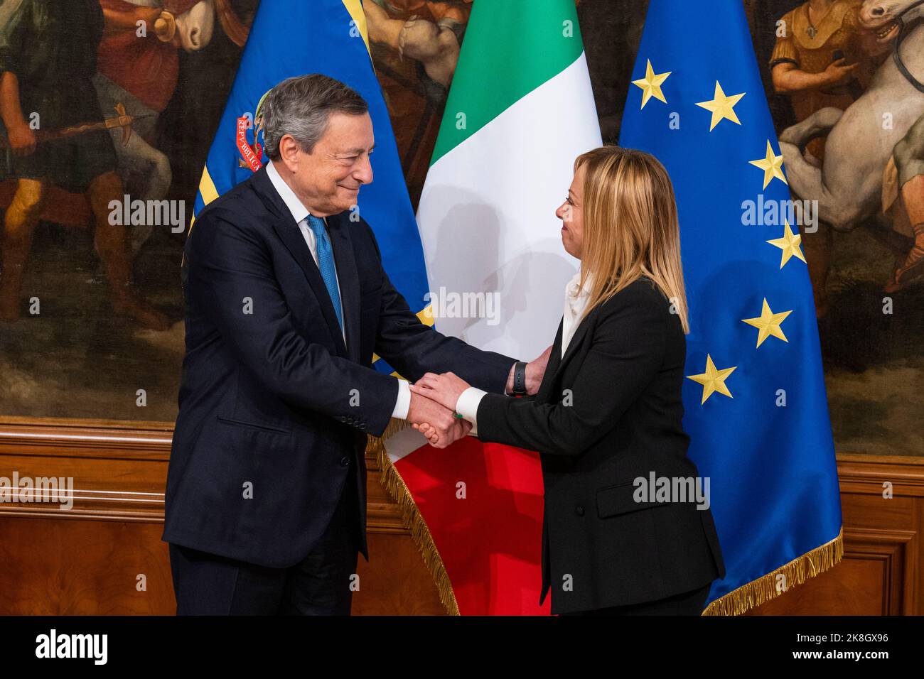 Rome, Italy. 23rd Oct, 2022. Outgoing Premier Mario Draghi shakes hands ...