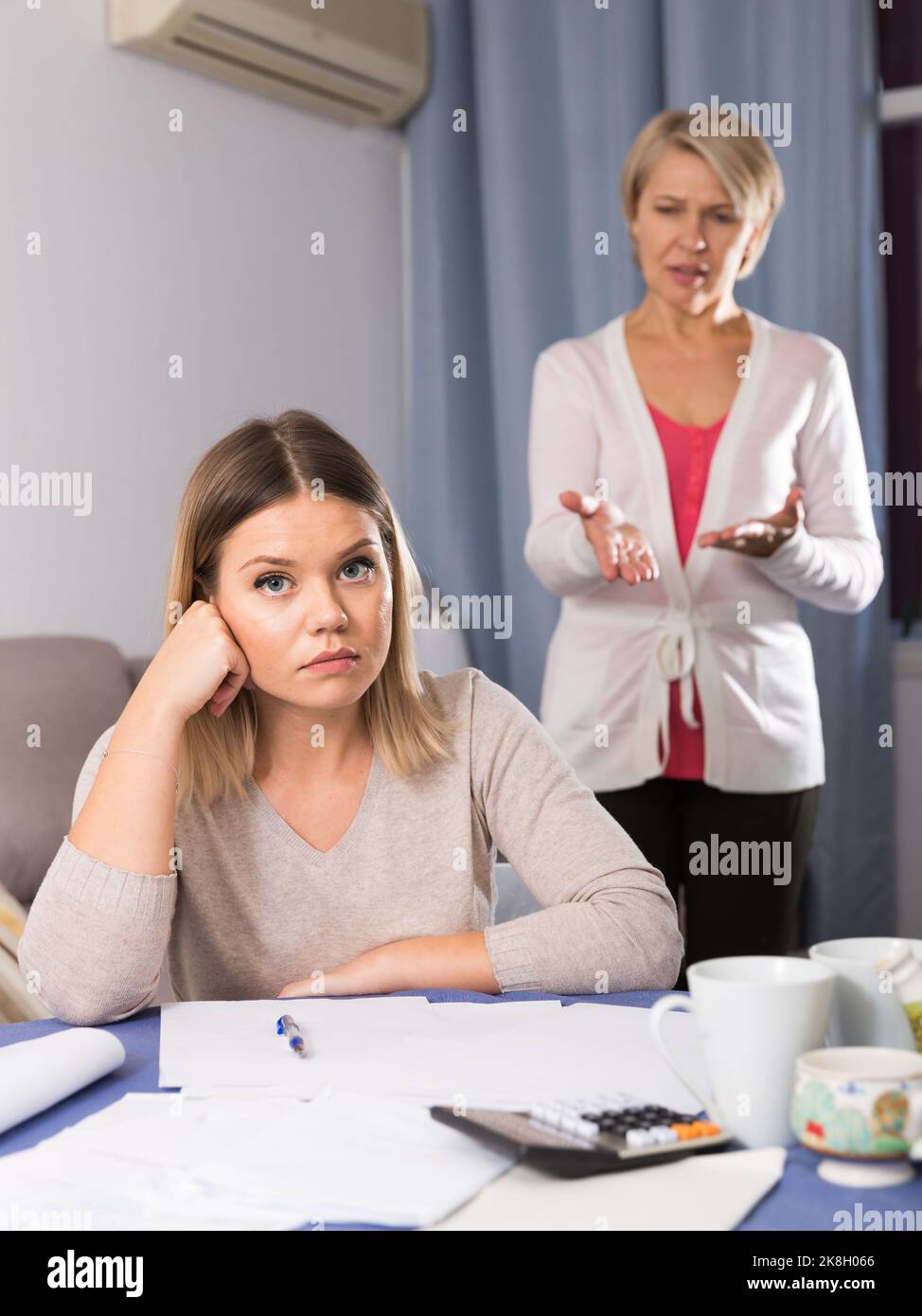 Mother scolds her adult daughter Stock Photo - Alamy