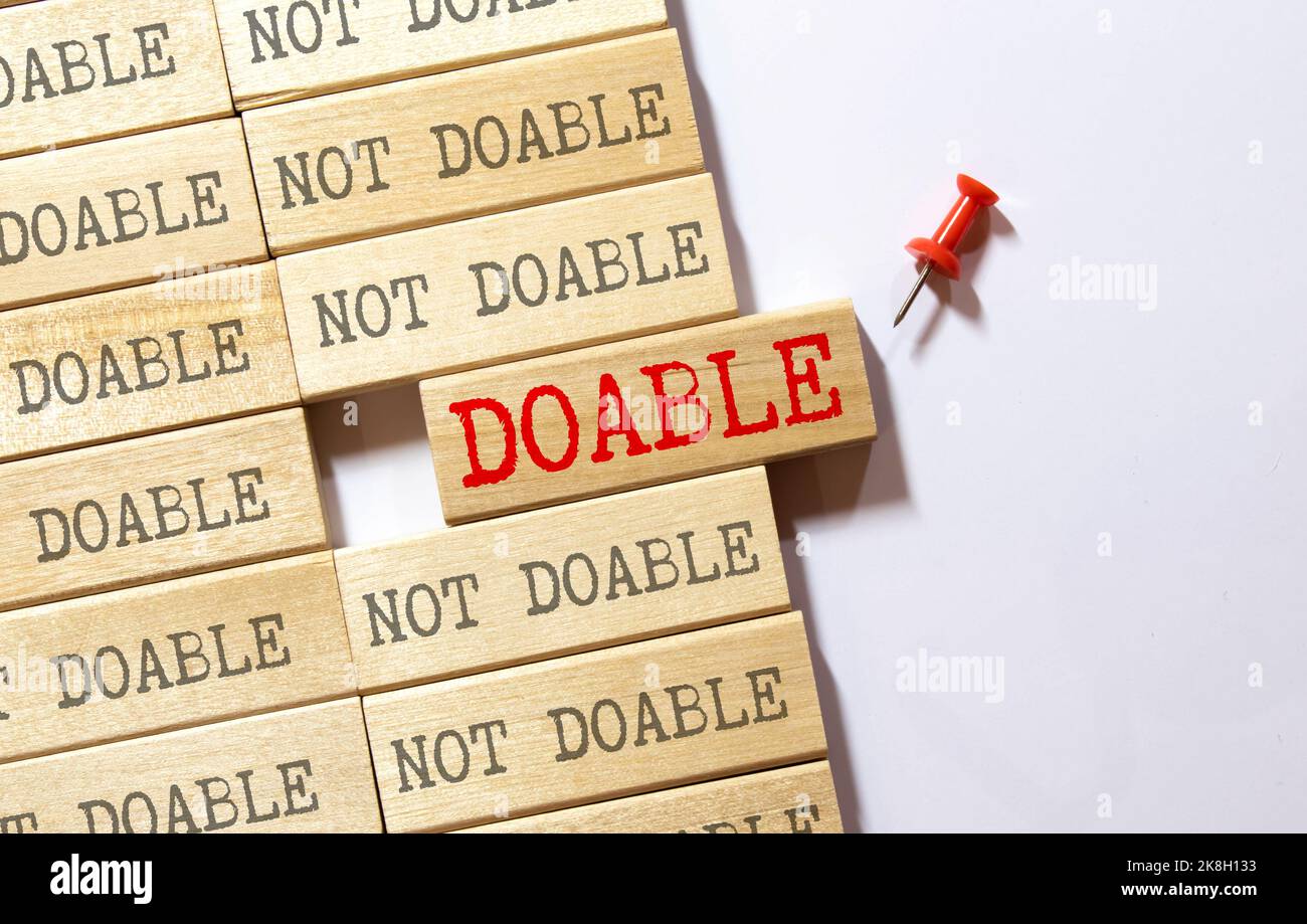 doable colorful word on the wooden background Stock Photo - Alamy