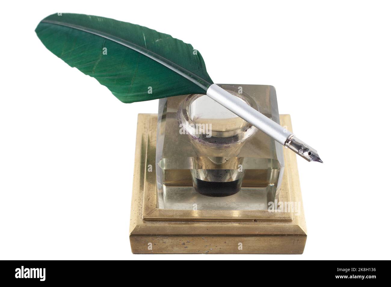 Old vintage feather quill with glass inkwell isolated on white ...