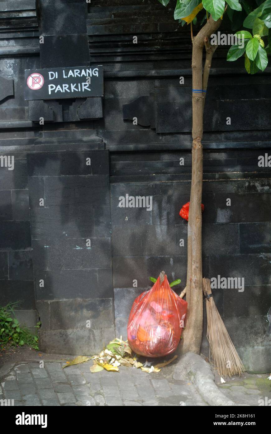 Di Larang Parkir (No Parking Sign) on wall of temple near the Tanah Lot ...