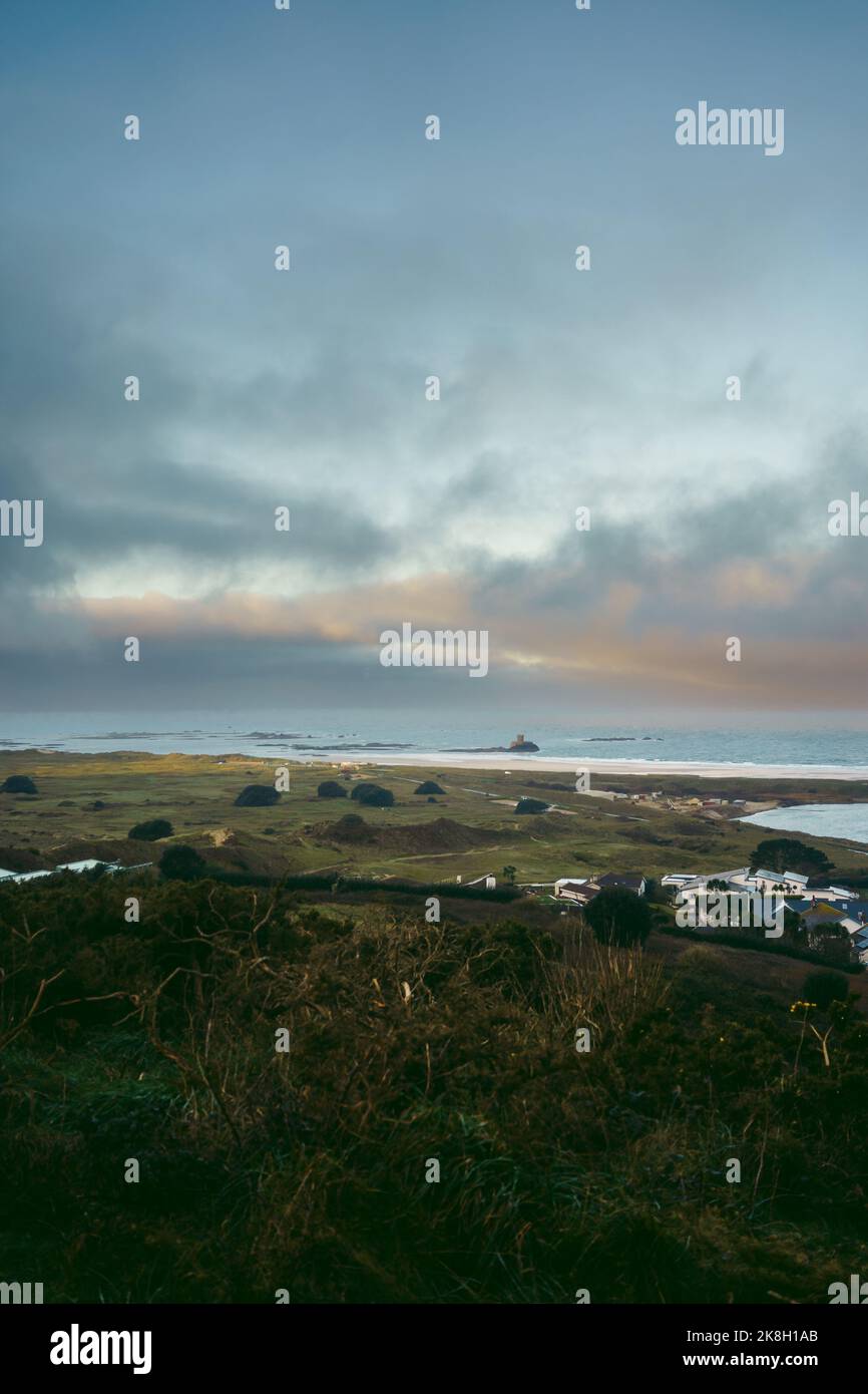 A beautiful view of La Rocco Tower from sand dunes in western Jersey ...