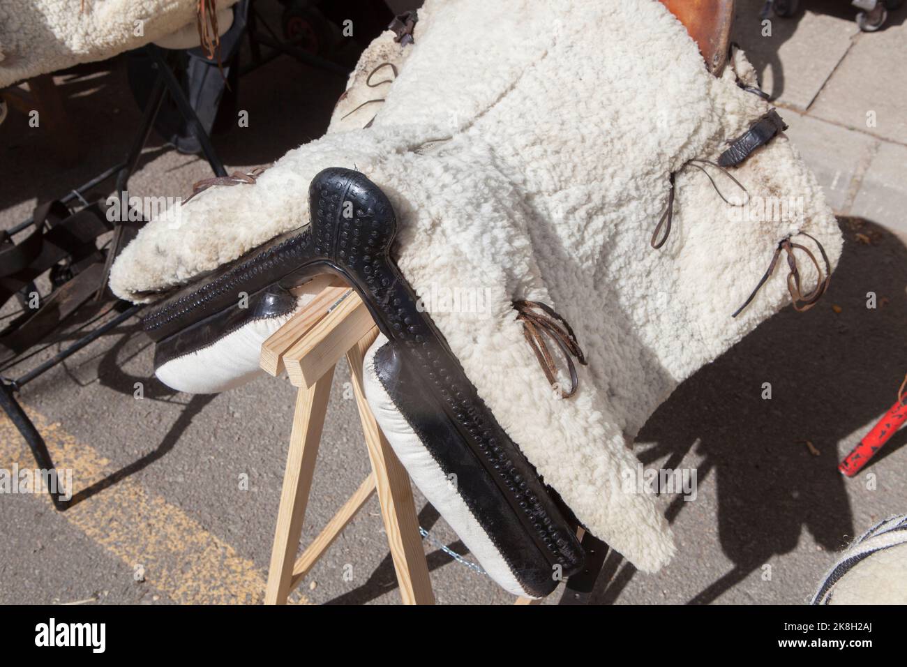 Rustic-style wool saddle. Saddlecraft items for sell Stock Photo - Alamy