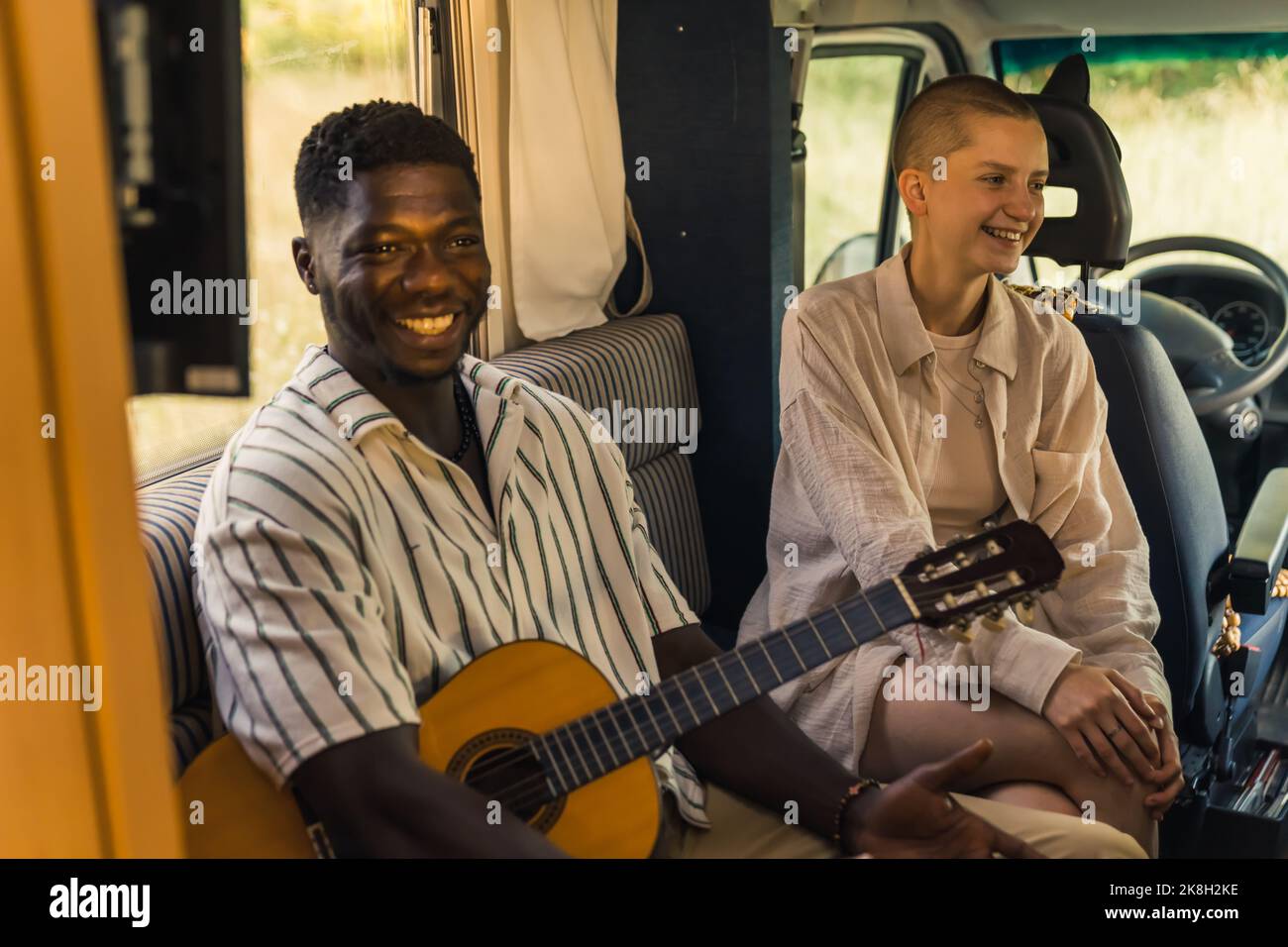 Indoor portrait of a couple of friends - handsome smiling black ...