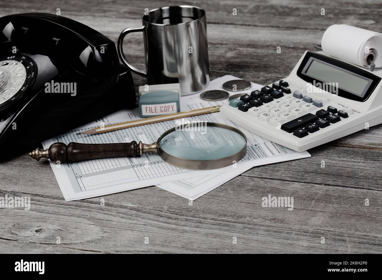 Antique or retro office items with individual tax return forms on ...