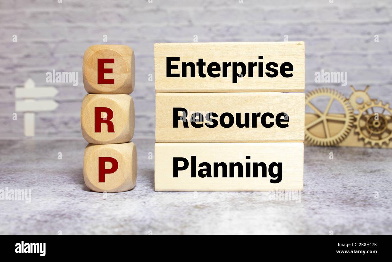 ERP message on tablet pc screen held by businessman hands - concept ...