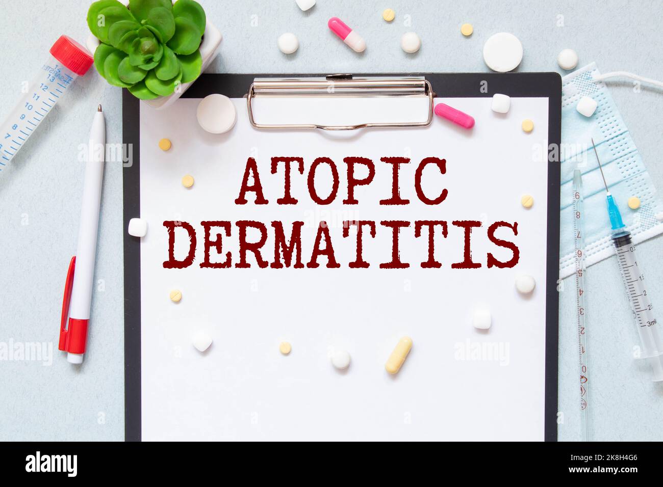 The diagnosis Atopic Dermatitis written on a clipboard Stock Photo - Alamy