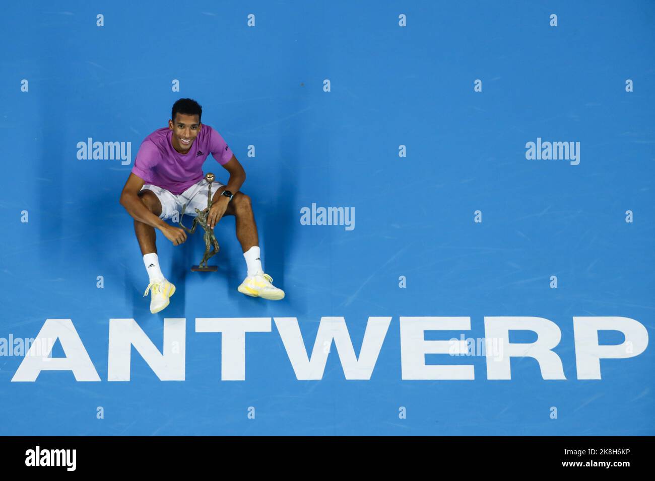 Canadian Felix Auger-Aliassime poses for the photographer with the winners trophy after the men ...