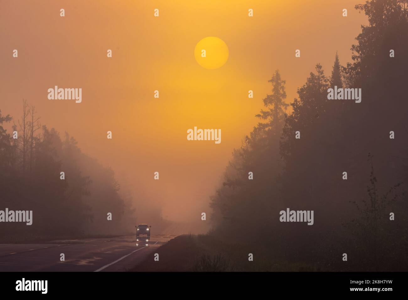 Autumn sunrise on HWY 77 in Clam Lake, Wisconsin Stock Photo - Alamy