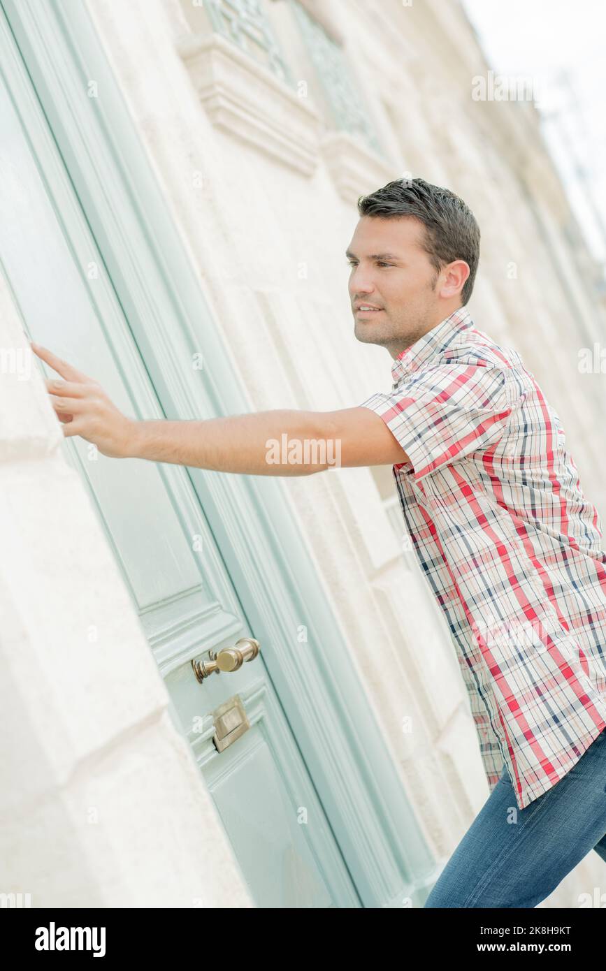 Pressing a door bell hi-res stock photography and images - Alamy