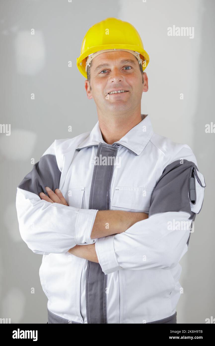 engineer standing confidently with a crossed arms Stock Photo - Alamy