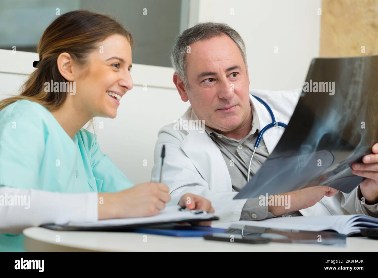 group of medical workers working together in hospital Stock Photo - Alamy