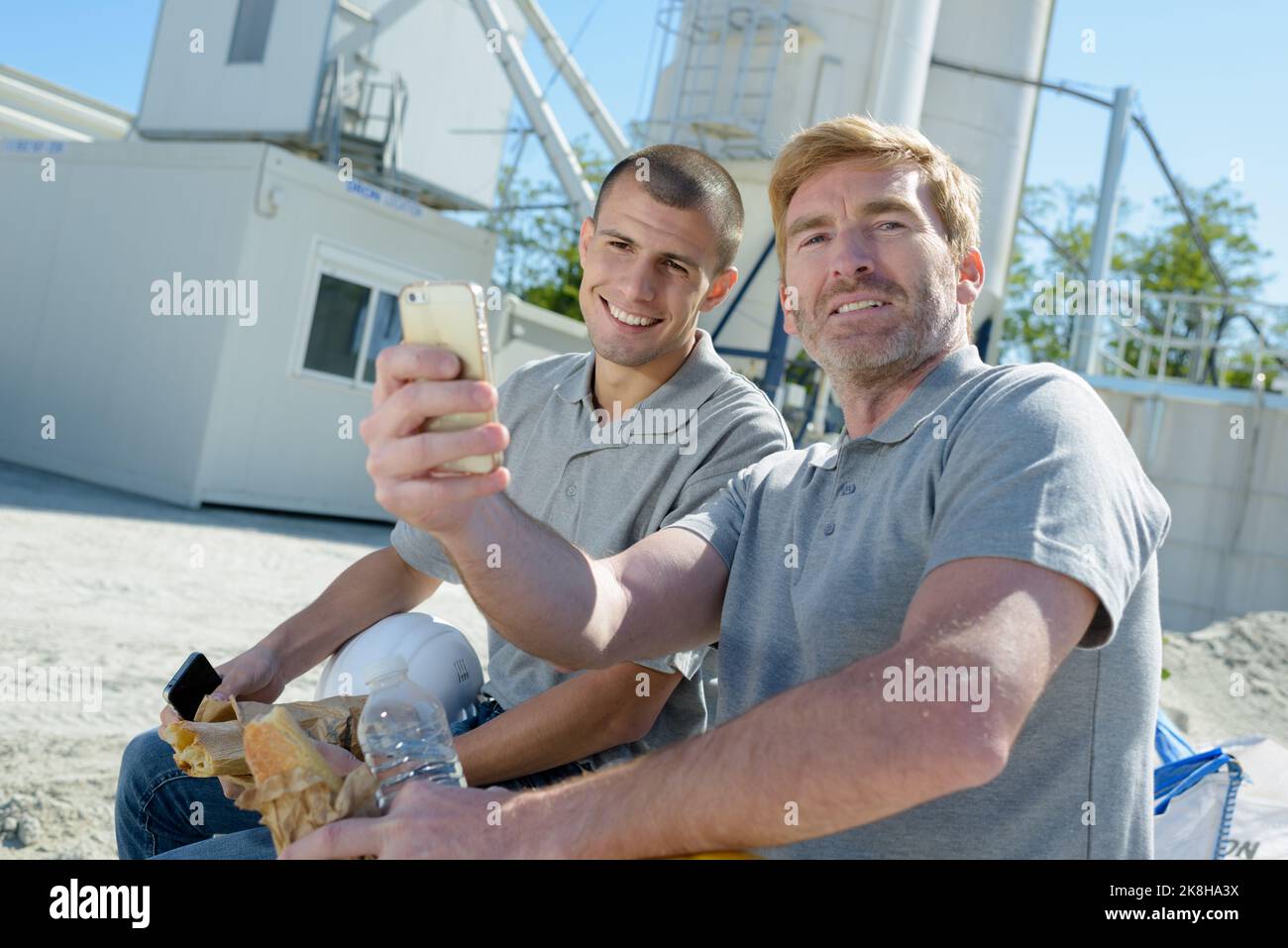 manufacturing workers during a break Stock Photo - Alamy