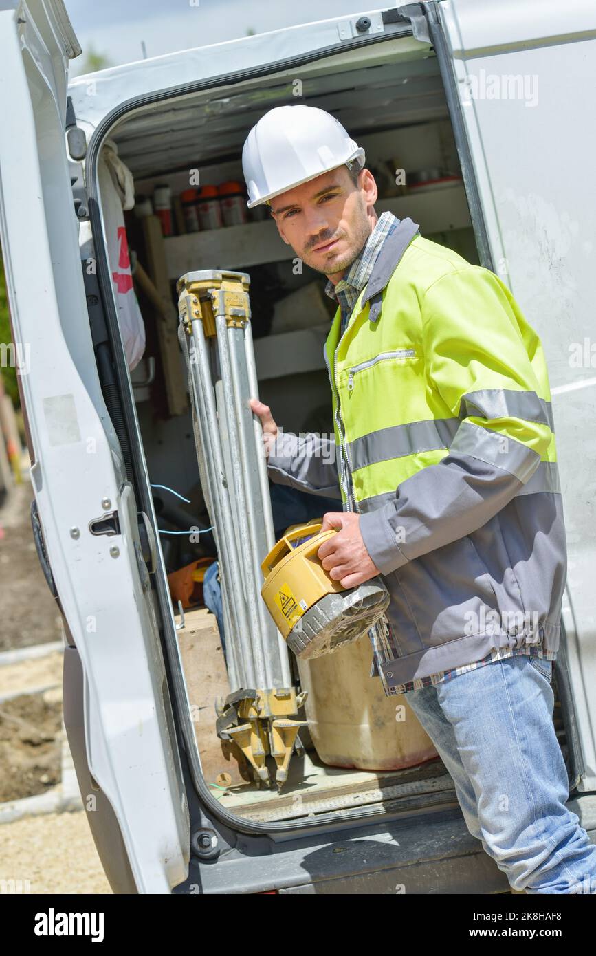man with a utility vehicle Stock Photo - Alamy