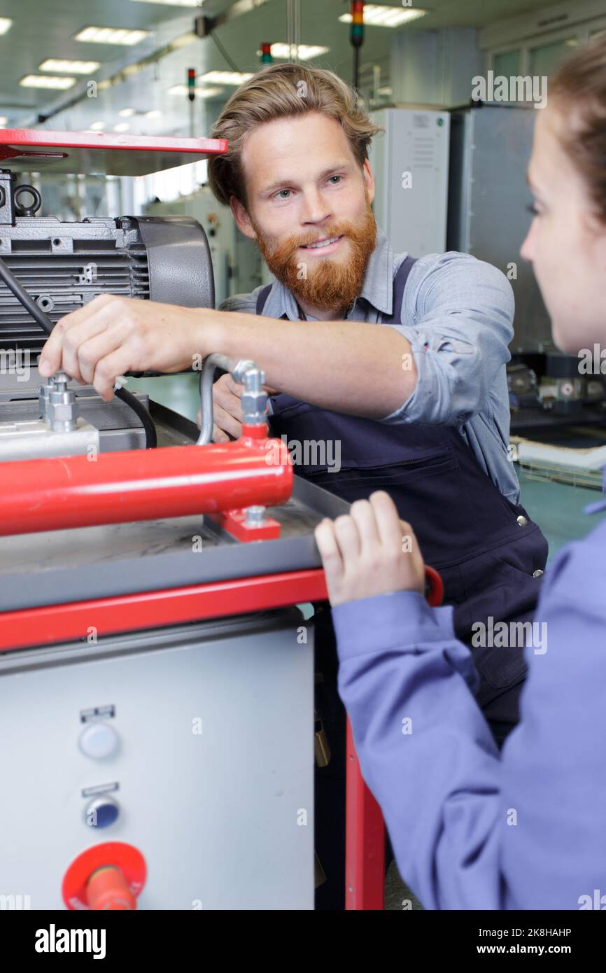 portrait of engineers using cad programming software on machine Stock ...