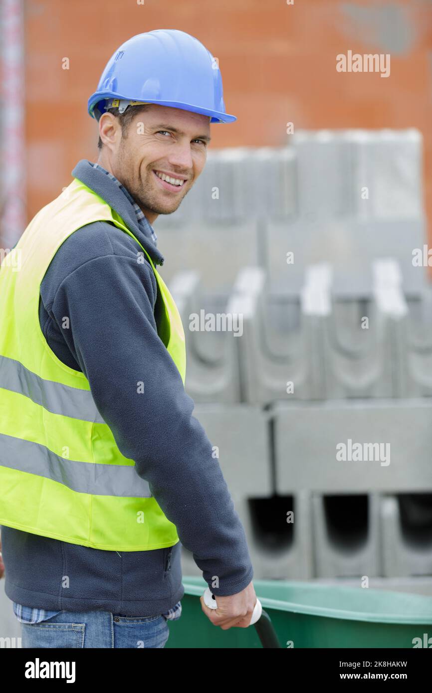 a male worker outside construction Stock Photo - Alamy