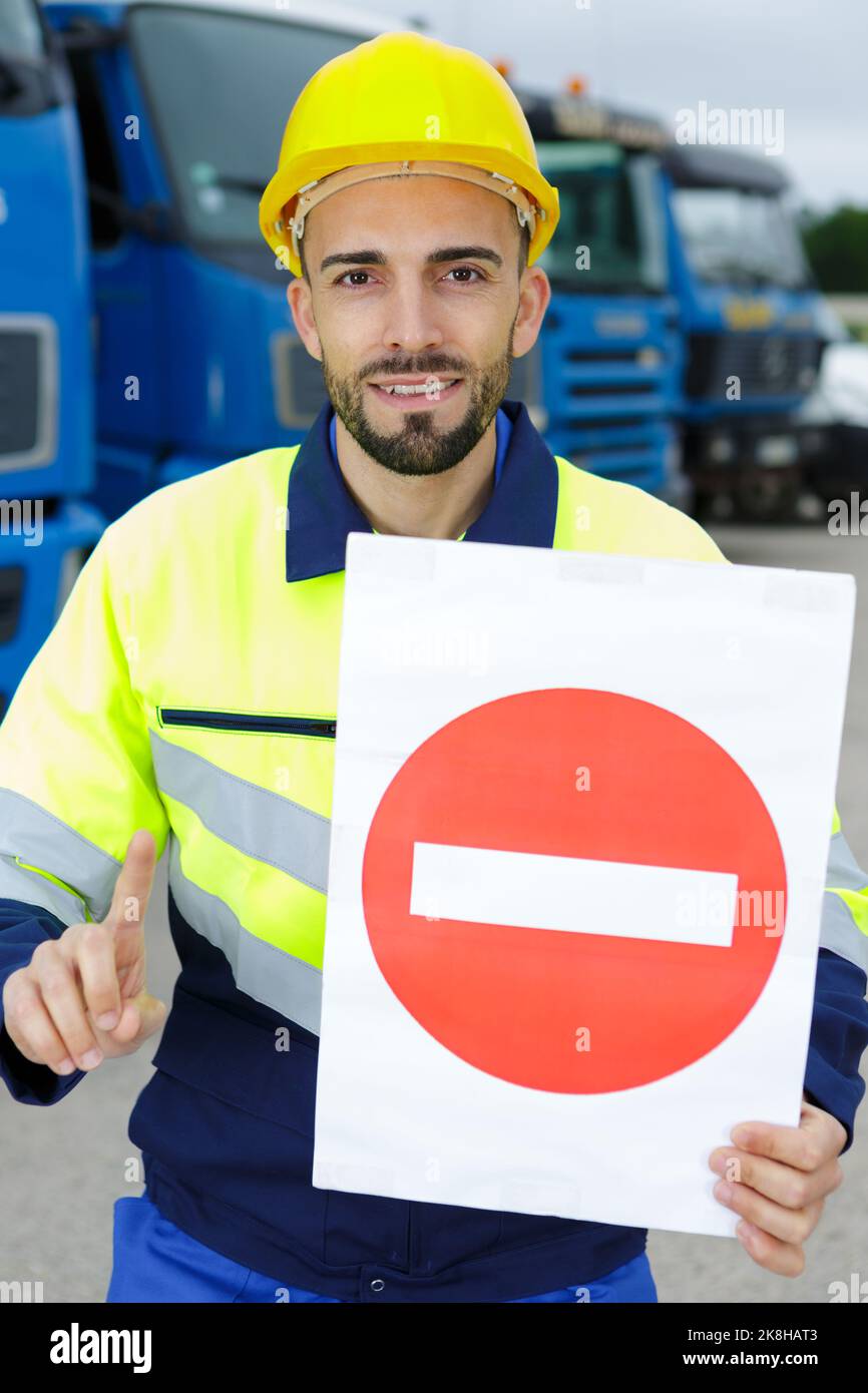 workman making stop sign Stock Photo - Alamy