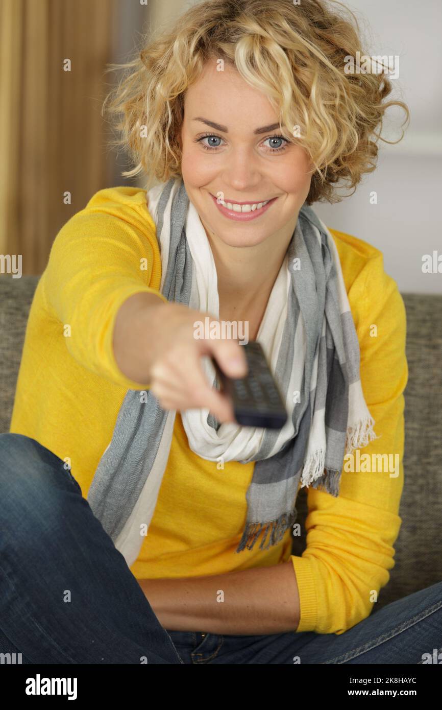 tv control in woman hand isolated on white background Stock Photo - Alamy