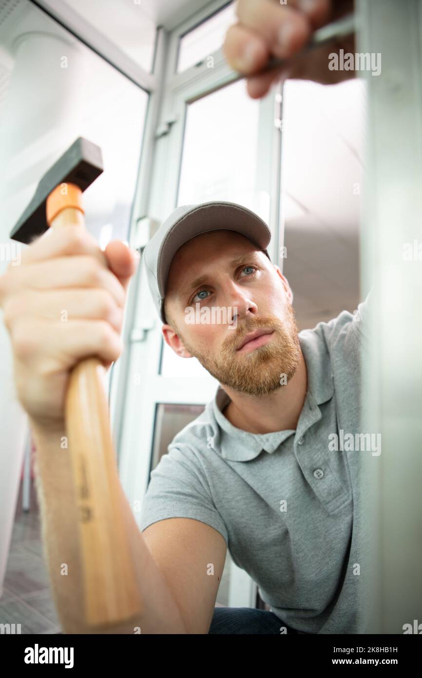 building and construction man builder in work clothes Stock Photo - Alamy