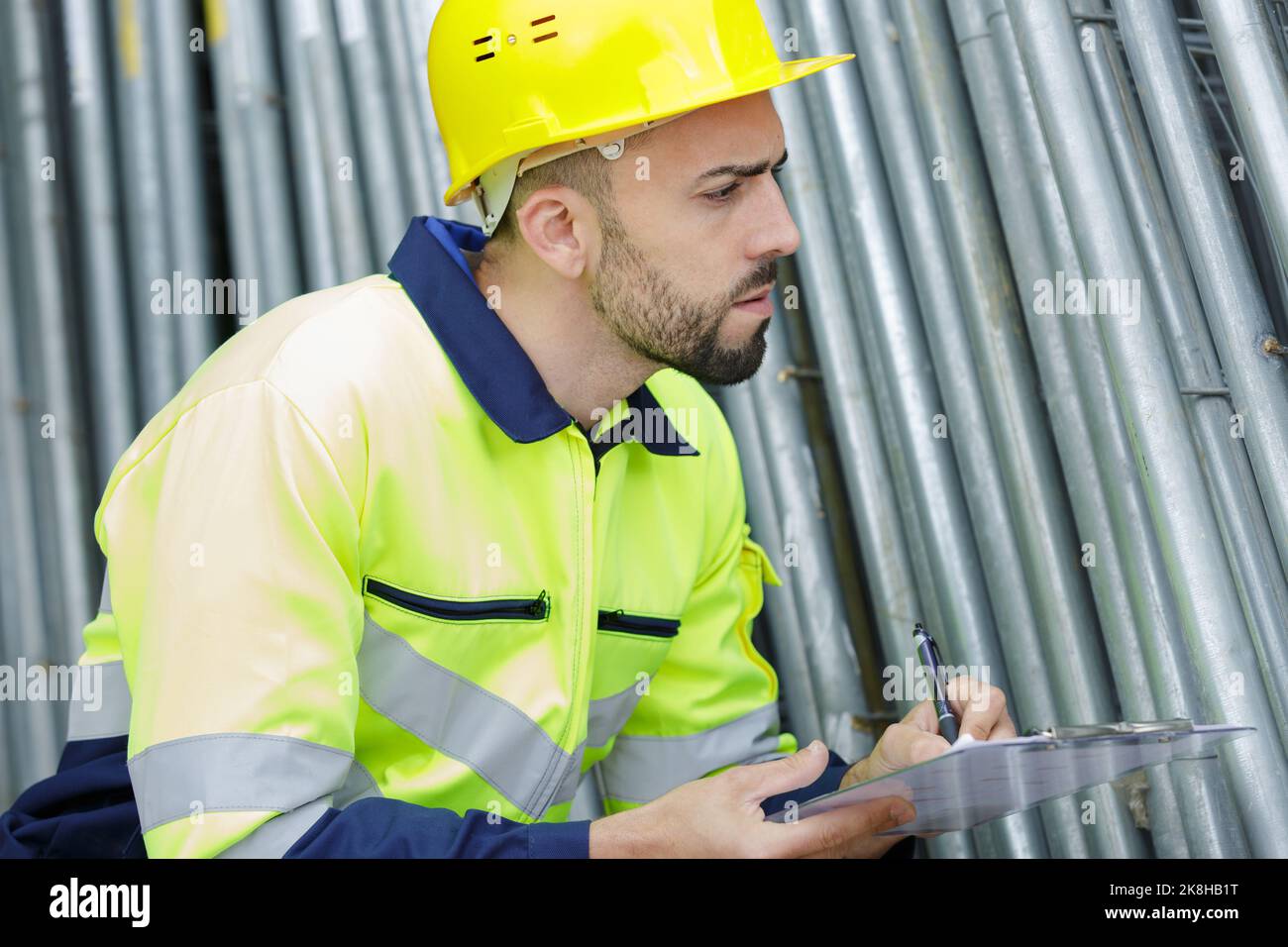 Back view male engineer clipboard hi-res stock photography and images ...
