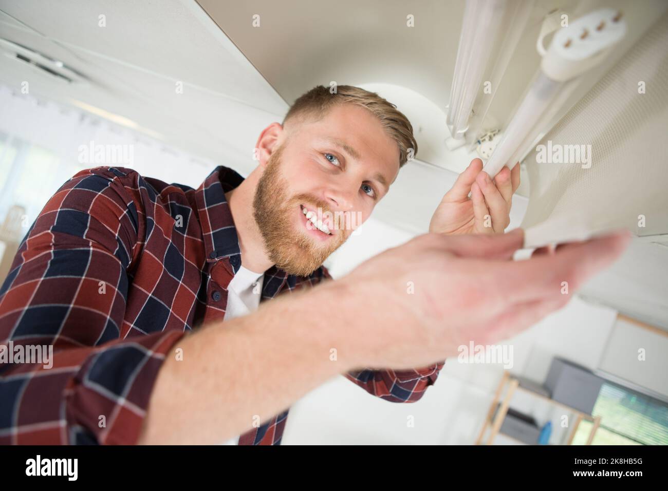 Fix fluorescent neon tube hi-res stock photography and images - Alamy