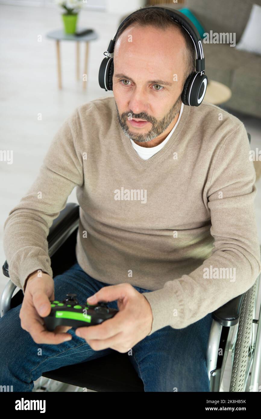 mature man in wheelchair playing computer game Stock Photo - Alamy mature man in wheelchair playing computer game Stock Photo - Alamy